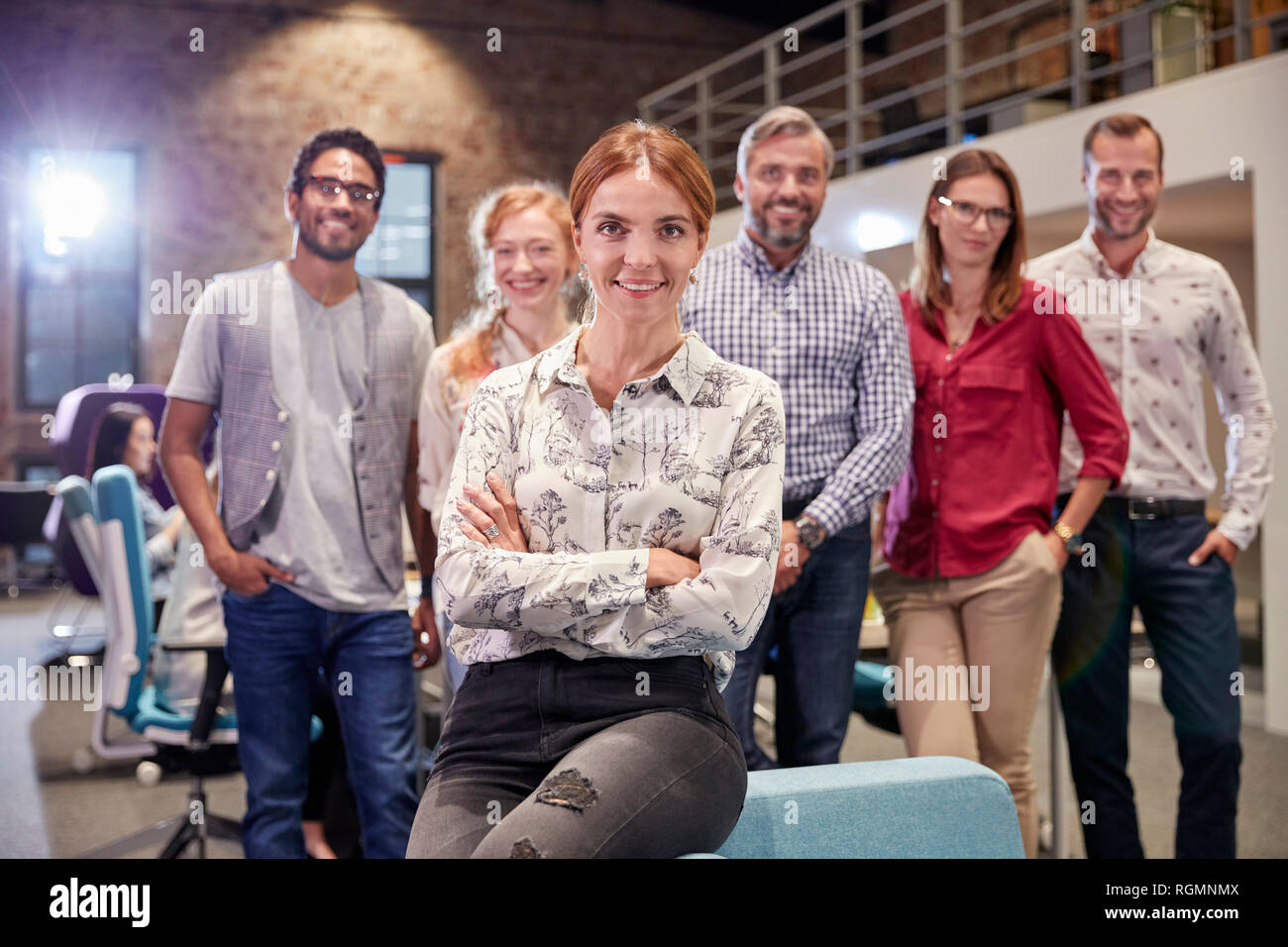 Group portrait of a team of colleagues working for a start up company ...