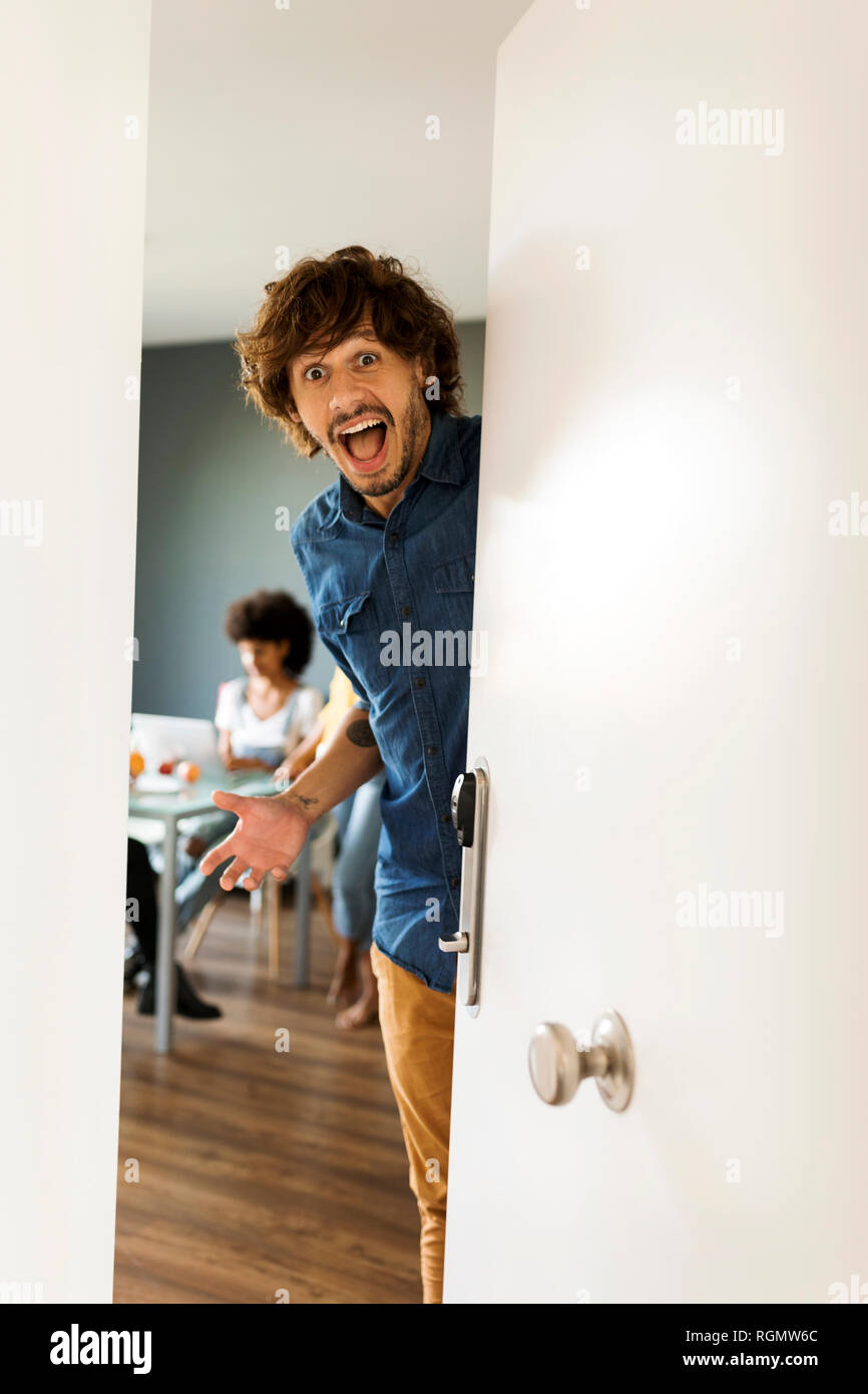 Man Opening A Door
