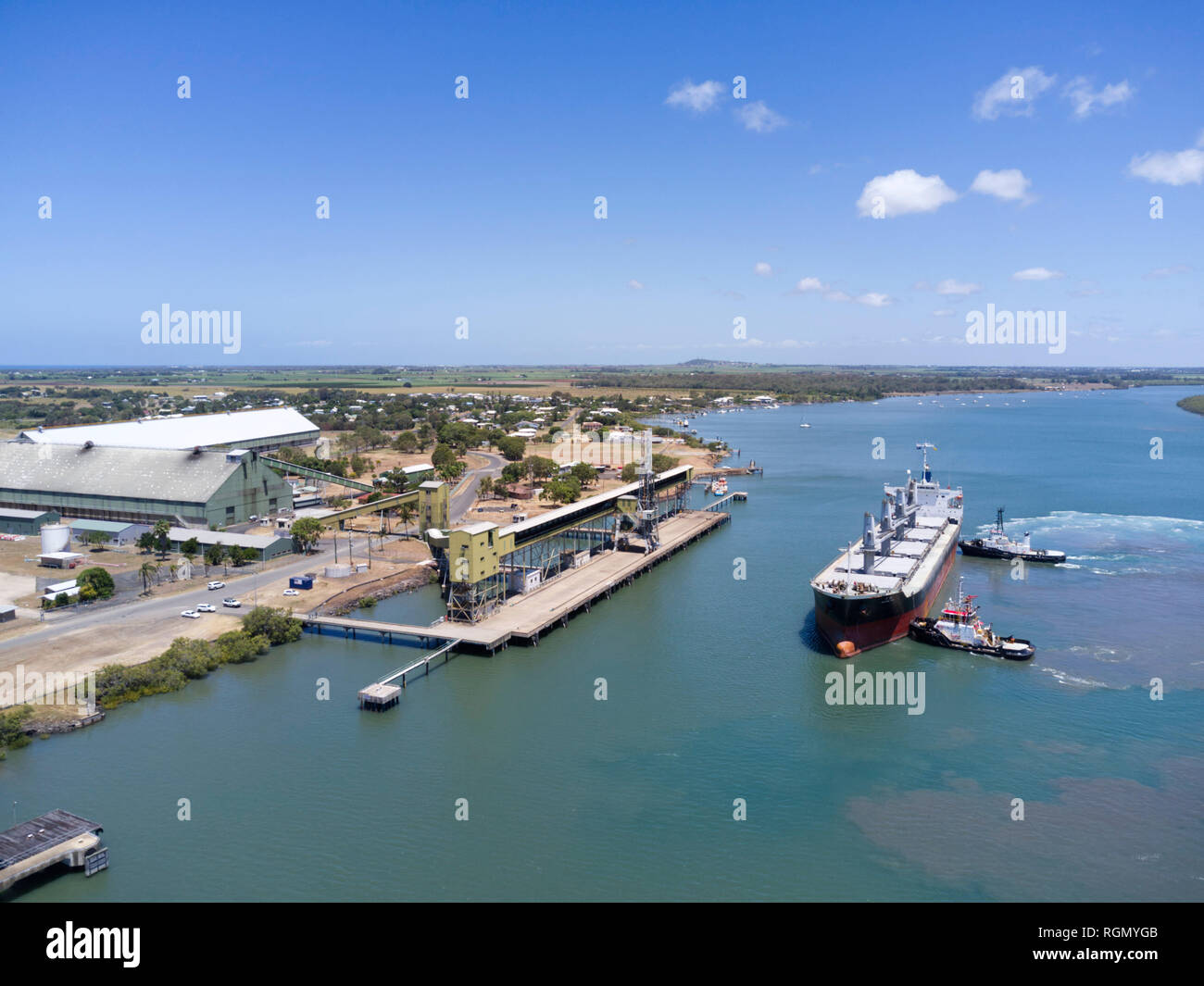 Aerial bulk carrier ship on the Burnett River berthing at the sugar ...