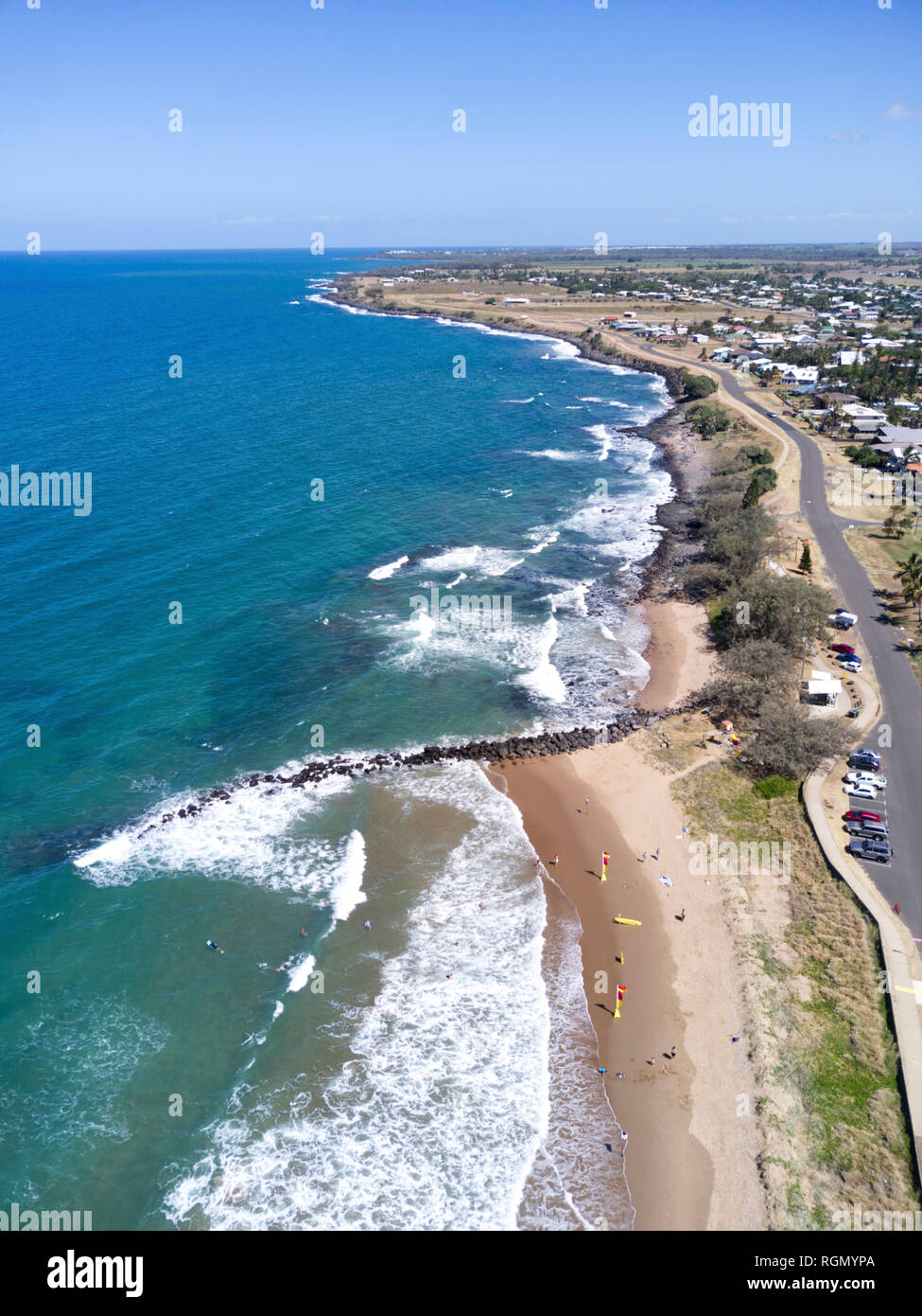 Aerial of a patrolled surf beach at Oaks Beach - Burnett Heads a ...