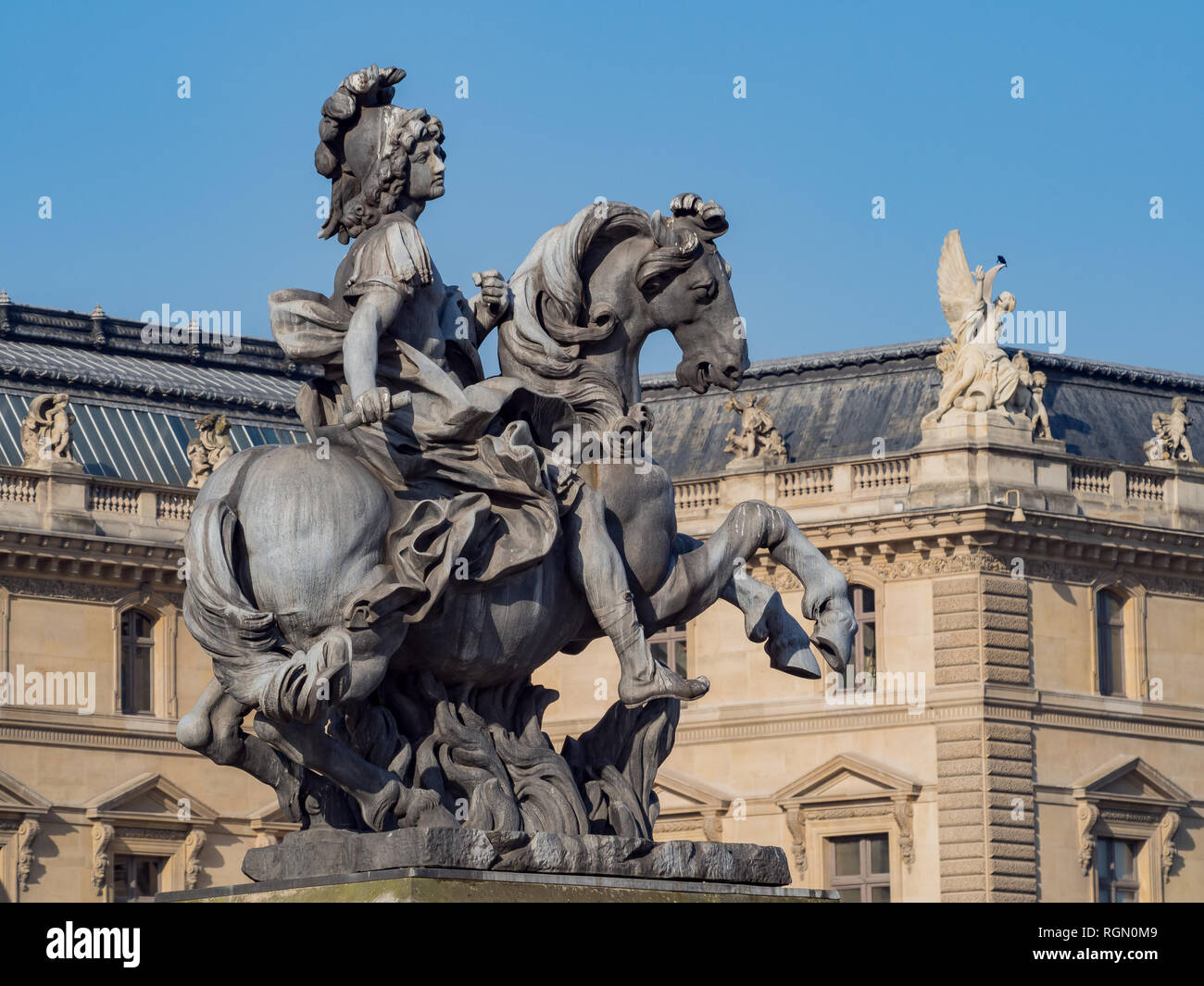 Close up shot of some statue of the famous Louvre Museum at Paris ...