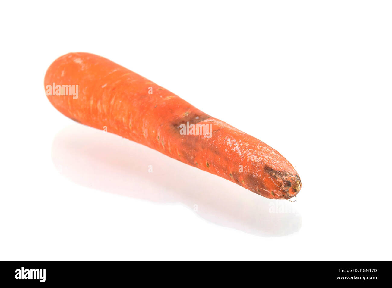 Rotten carrot isolated on white background Stock Photo - Alamy