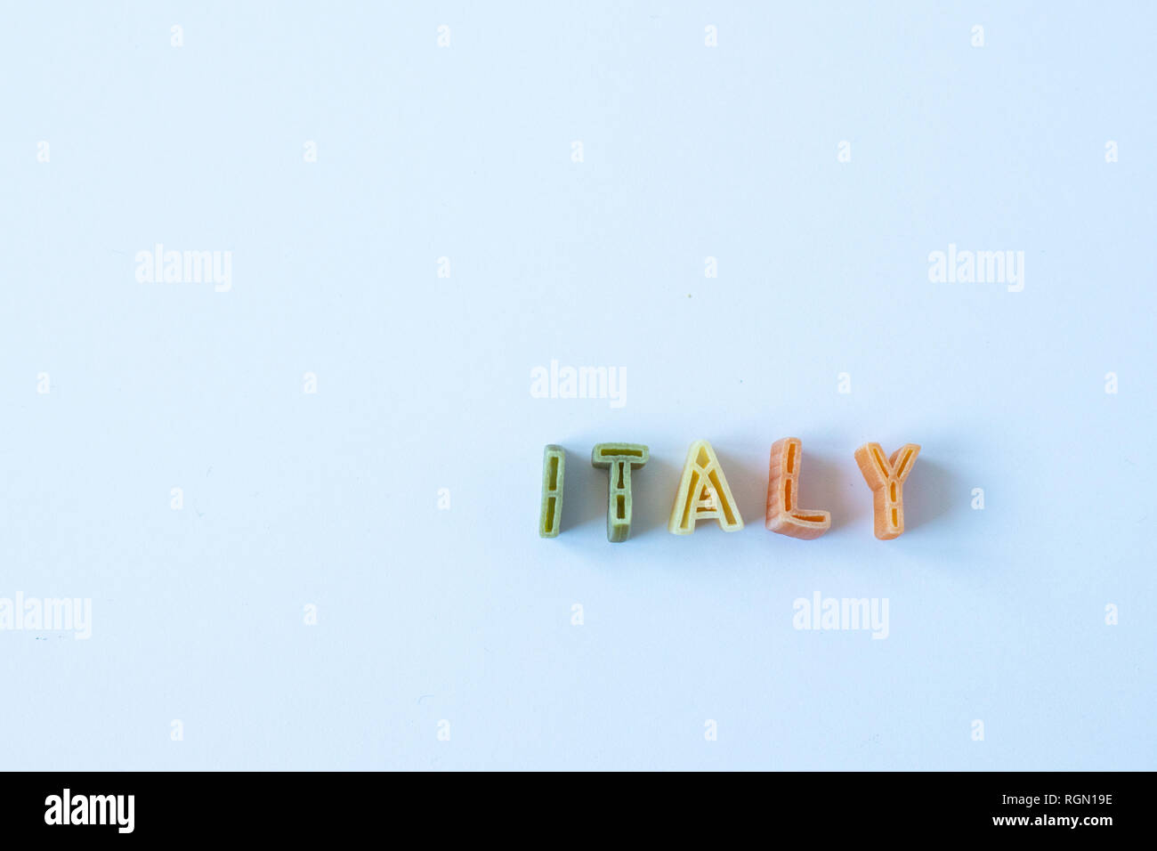 The word "Italy" composed with real pasta letters in the italian flag ...