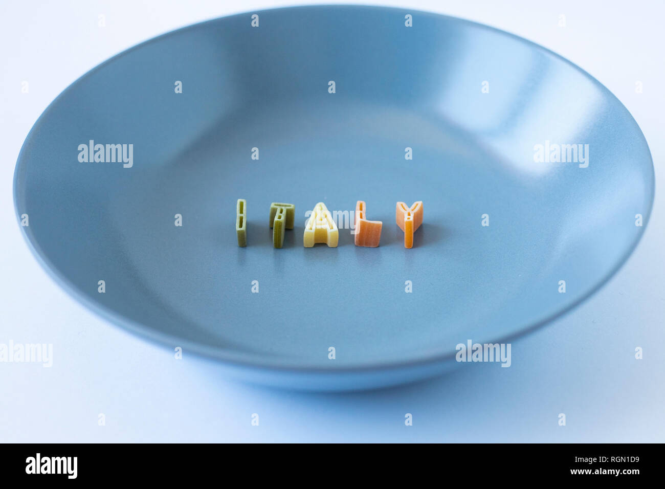 The word "Italy" composed with real pasta letters in the italian flag ...