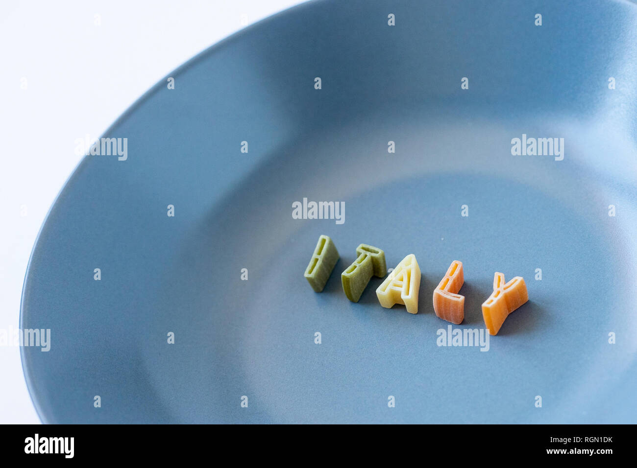 The word "Italy" composed with real pasta letters in the italian flag ...