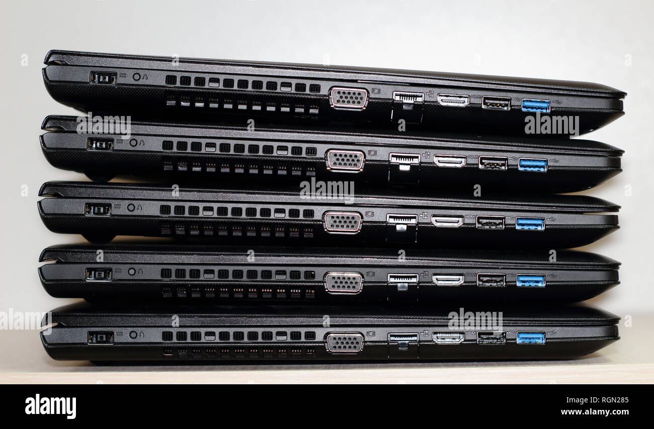 Input and connection sockets on side of laptops folded stack isolated ...