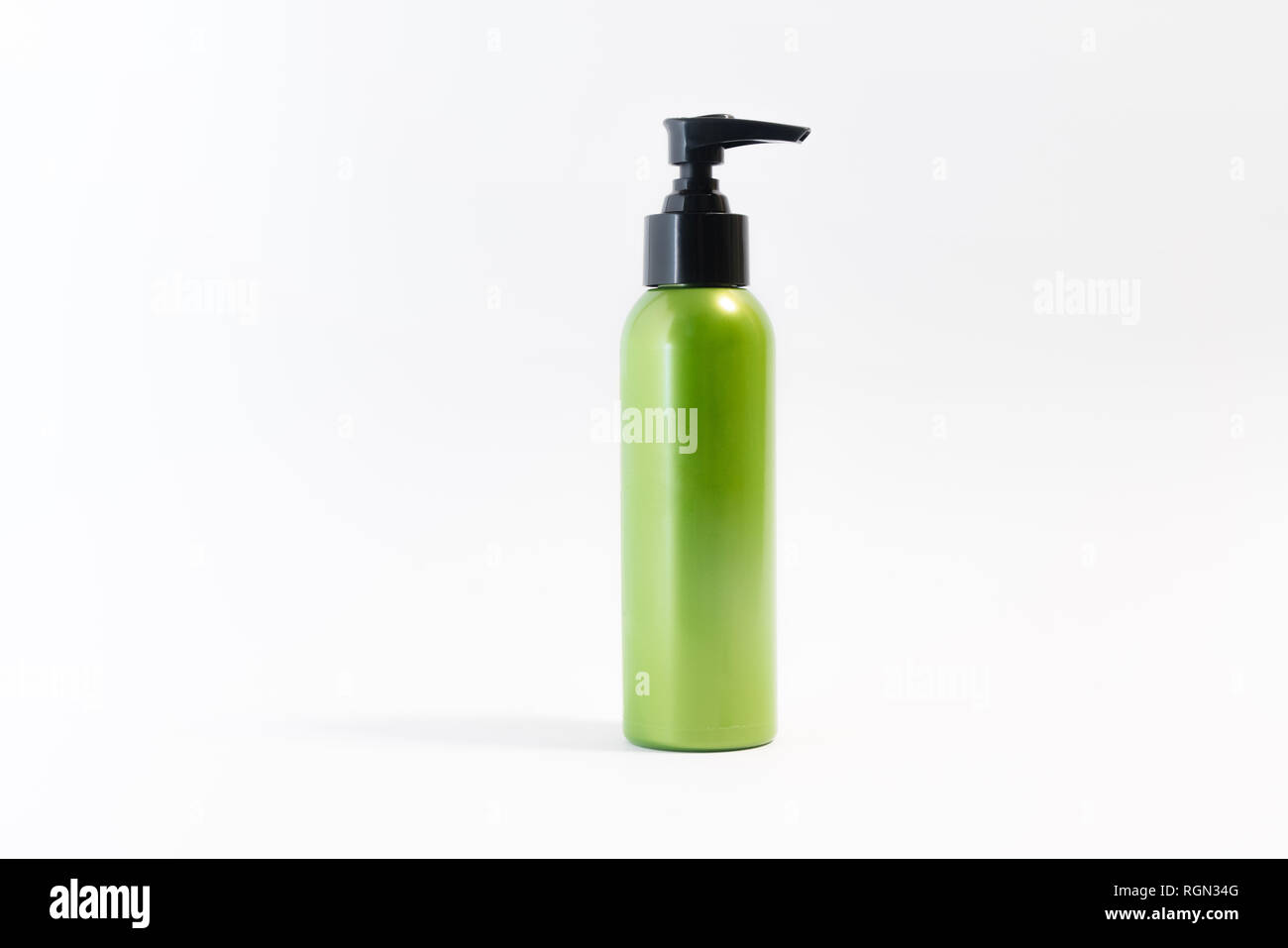Blank plastic hand cream bottle on white background. Copy space for ...