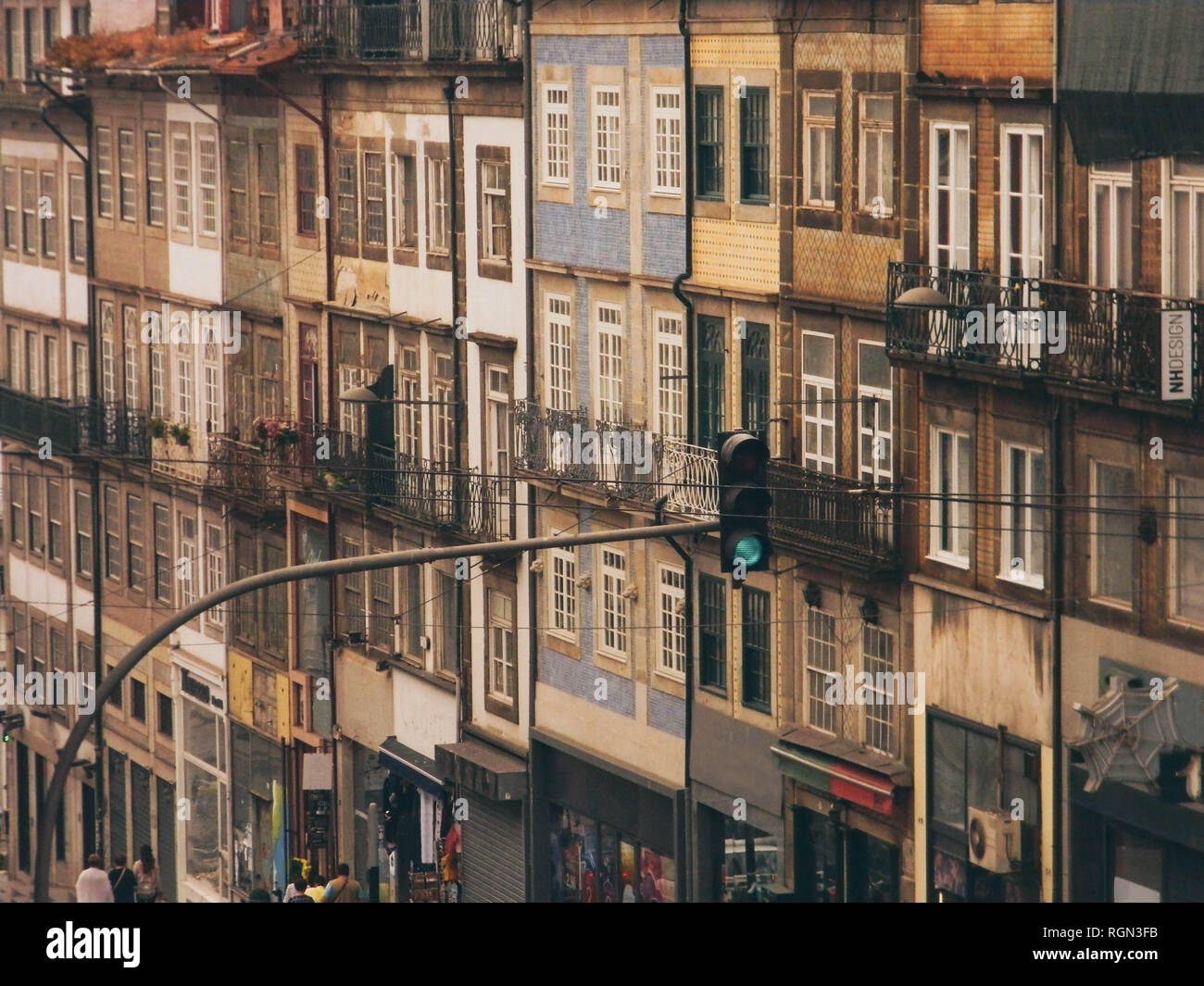 Traditional row houses in Porto Portugal with unique patterns on them ...