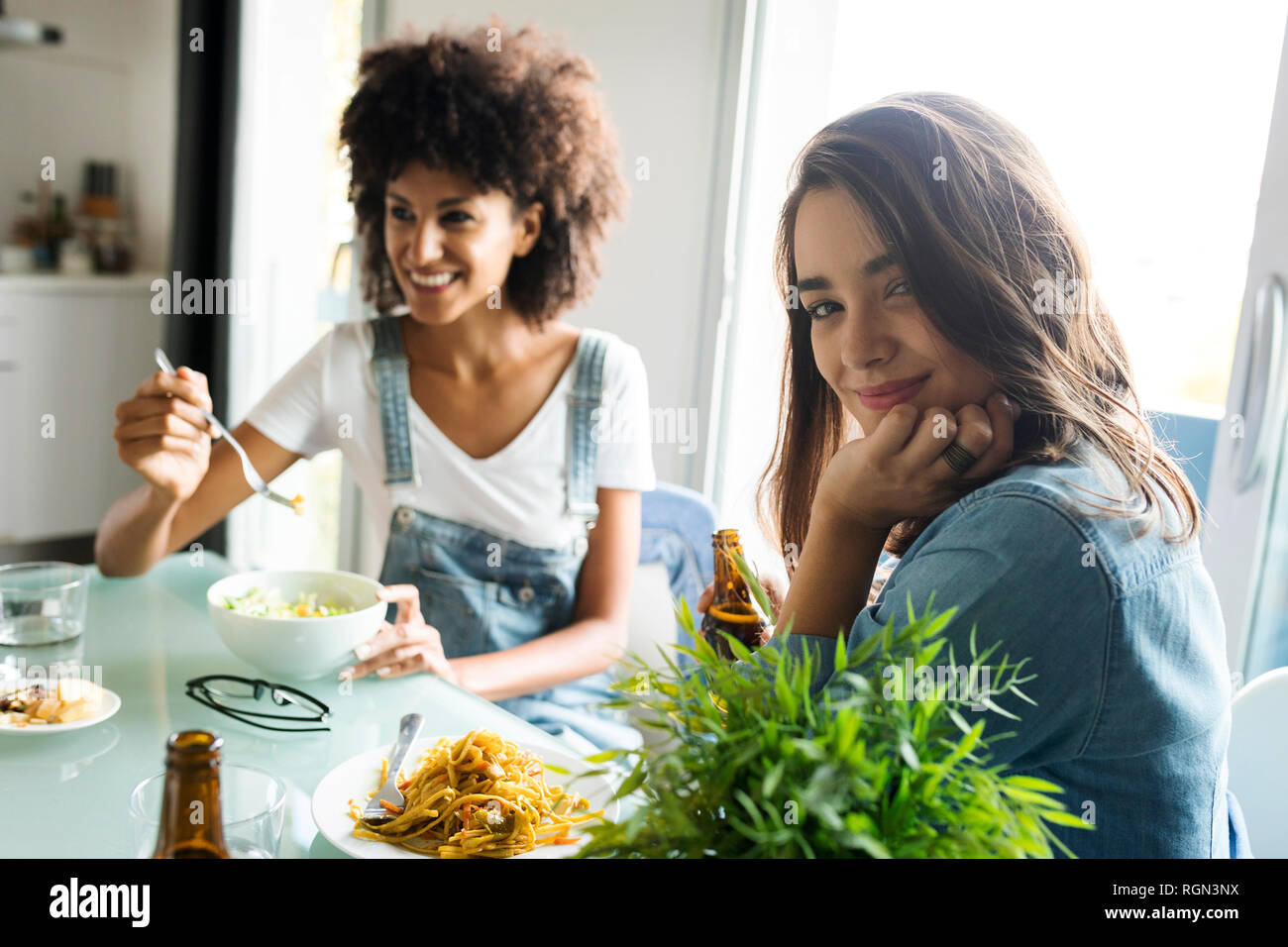 Sitting table eating hi-res stock photography and images - Alamy