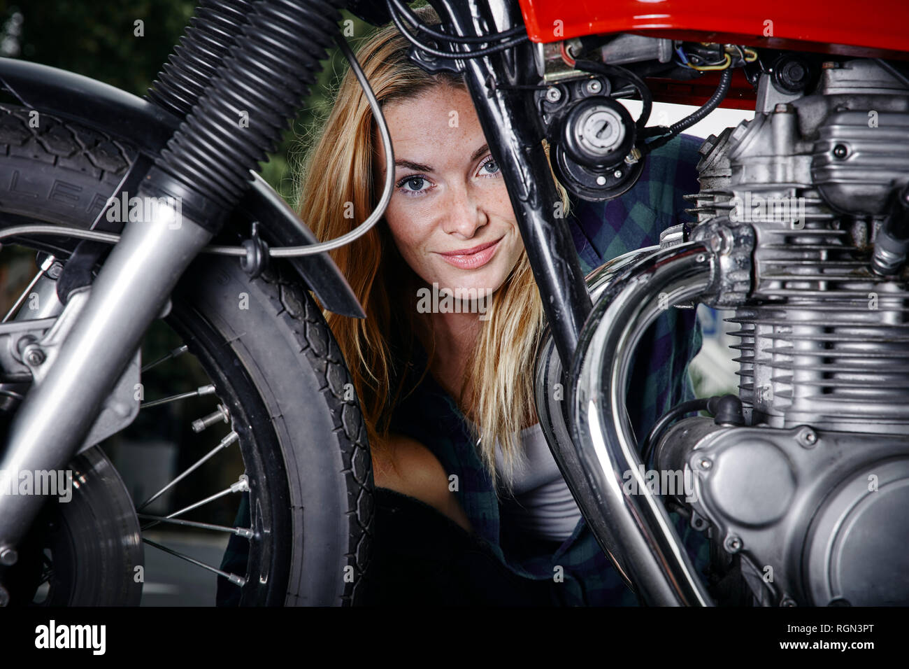 Woman with motorcycle hi-res stock photography and images - Alamy