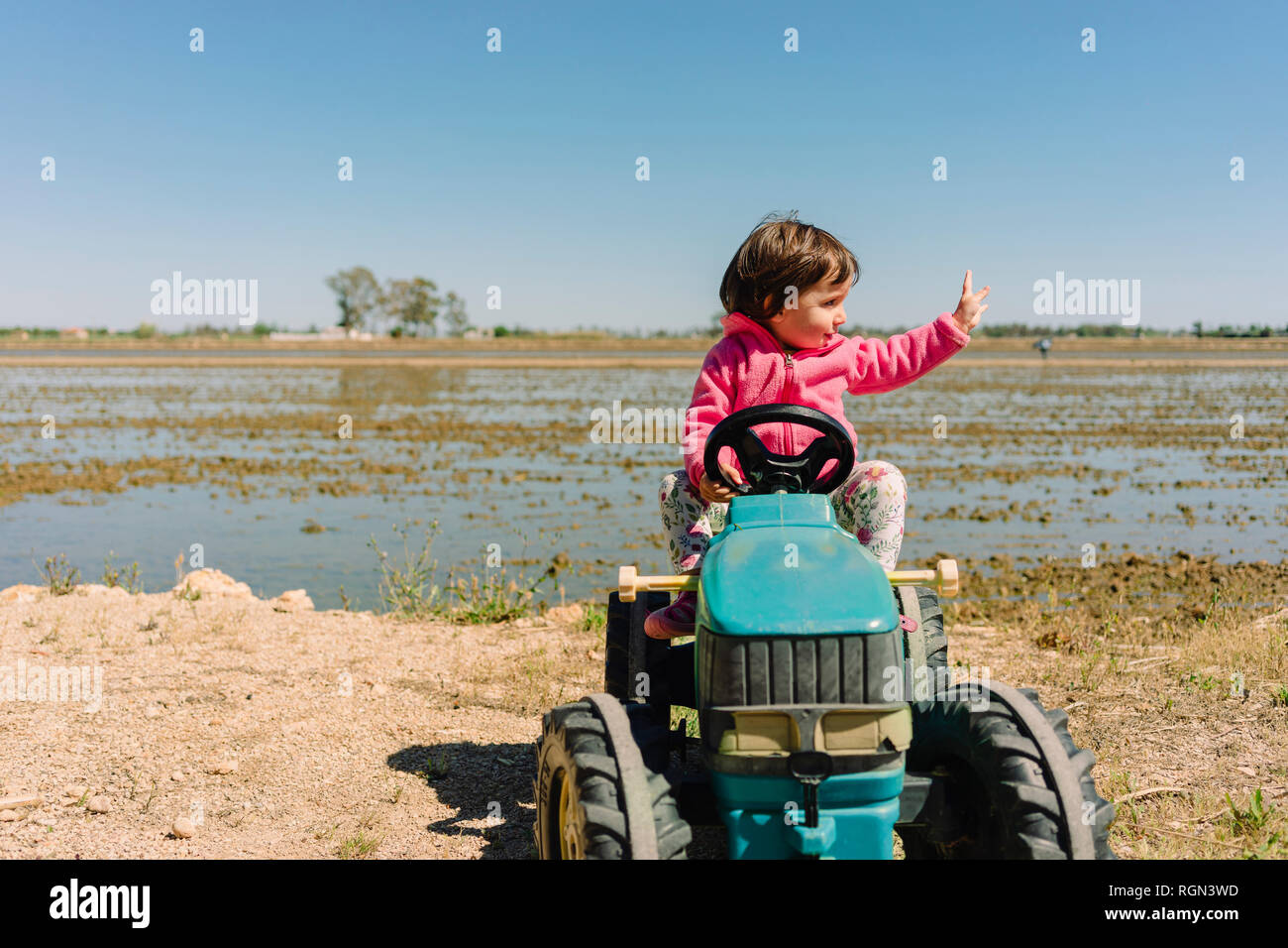 Girl driving tractor hi-res stock photography and images - Alamy
