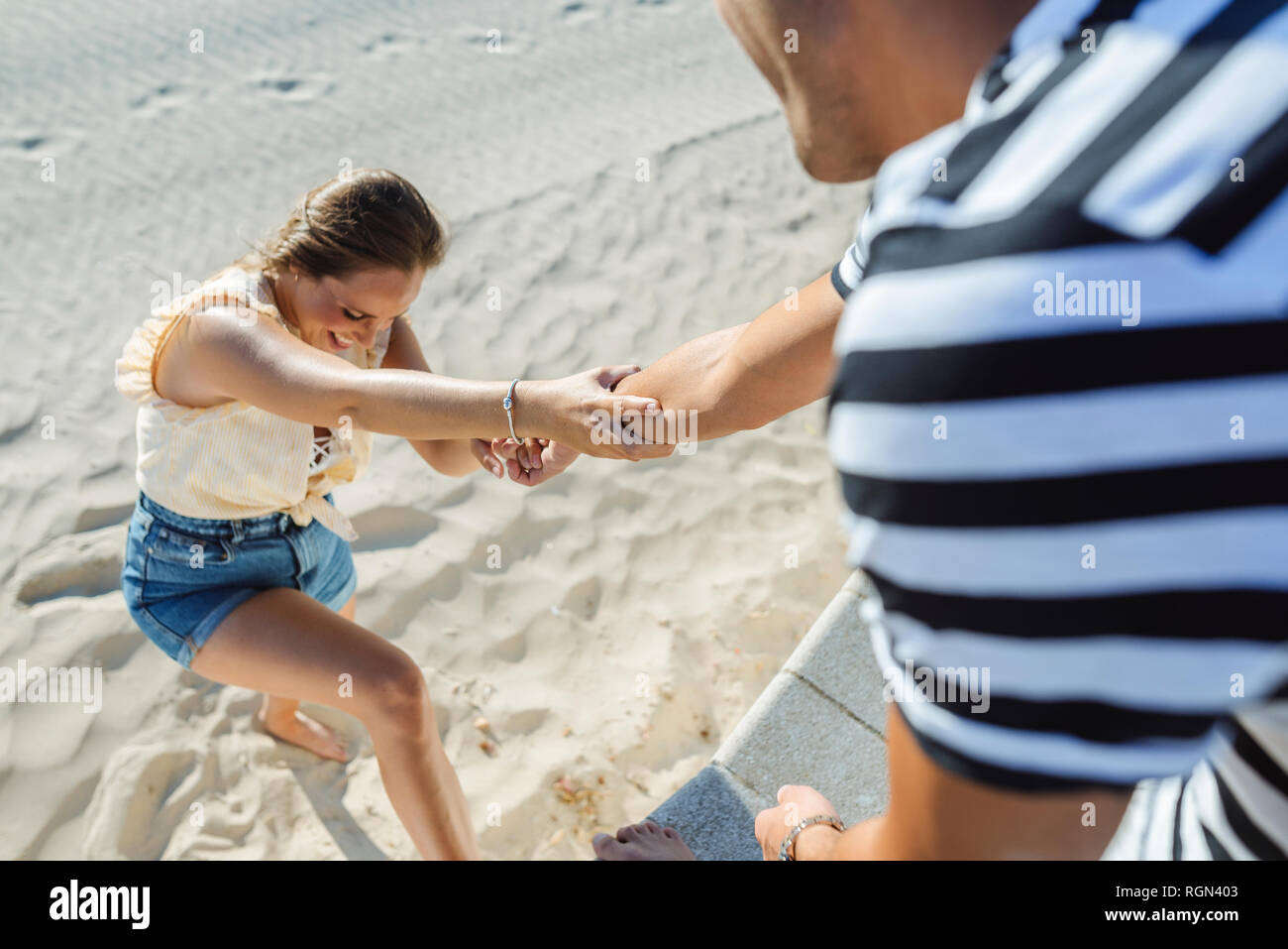 Woman grabbing man hi-res stock photography and images - Alamy