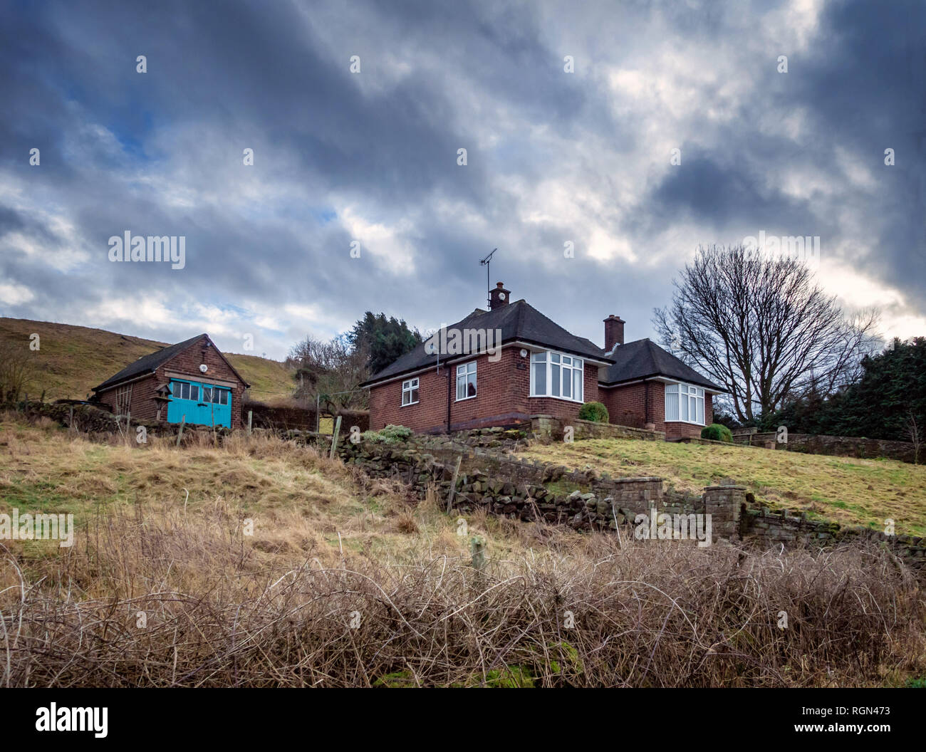 Isolated country and unmodernised bungalow on a steep plot near Barlow ...