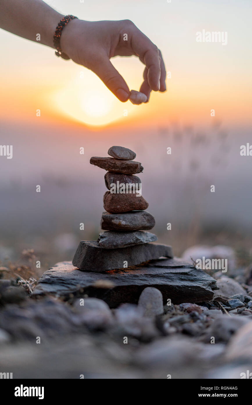 Placing stone hi-res stock photography and images - Alamy