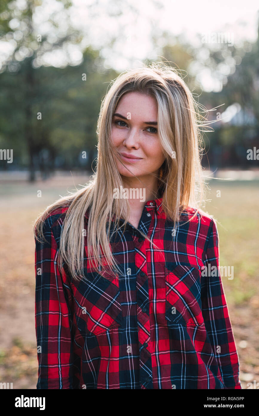 Woman wearing plaid shirt hi-res stock photography and images - Alamy