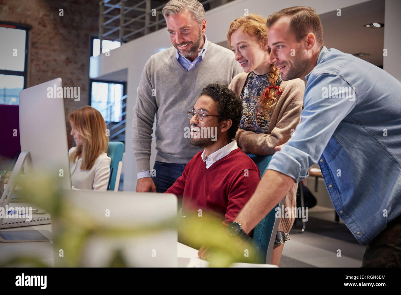 Looking over shoulder at computer hi-res stock photography and images ...