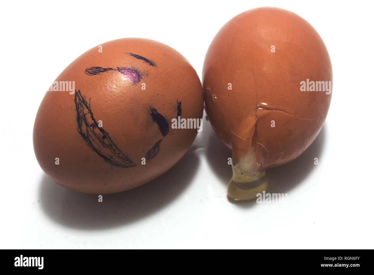 two egg and broken one egg hole close up isolated on white background ...