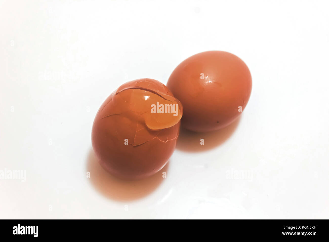 Shell on two white egg hi-res stock photography and images - Alamy