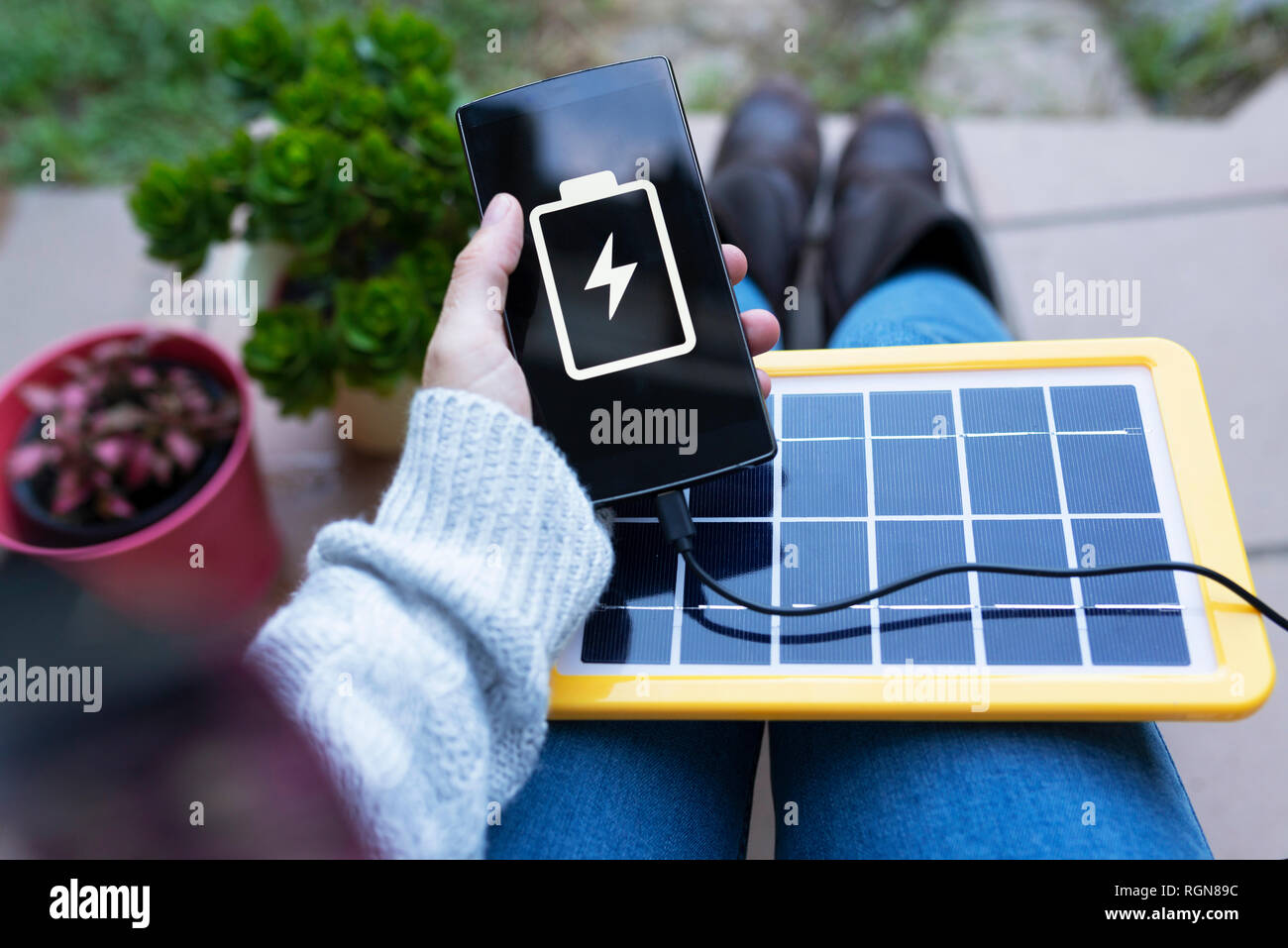 Mobile phone solar energy hi-res stock photography and images - Alamy