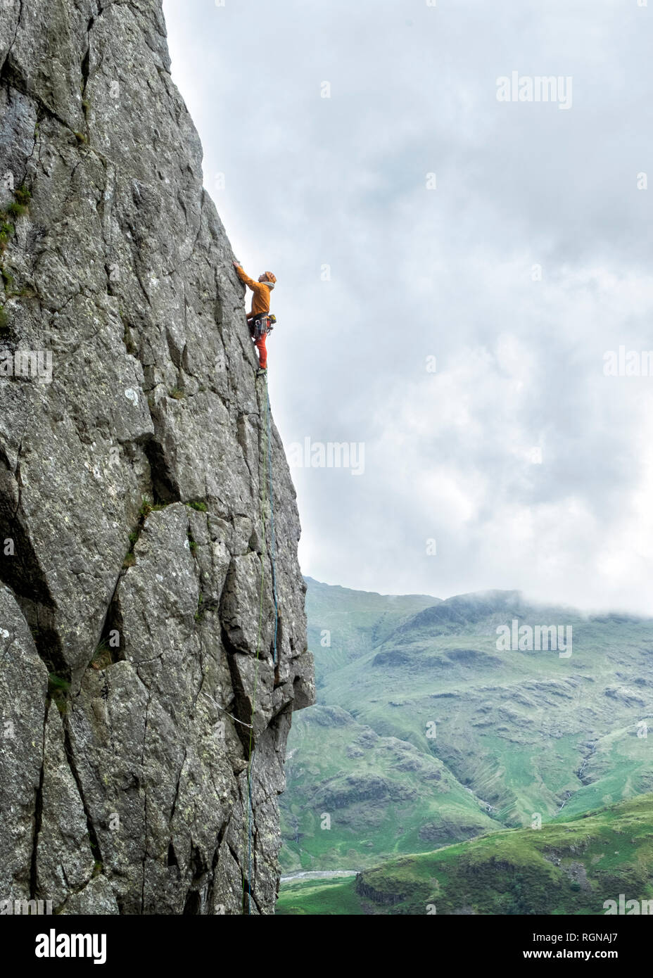 United Kingdom, Lake District, Langdale Valley, Gimmer Crag, climber on ...