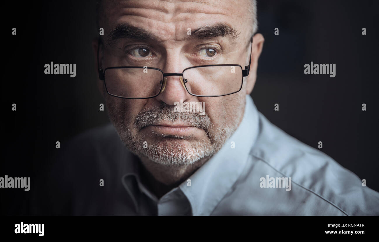 Man looking sideways old senior hi-res stock photography and images - Alamy
