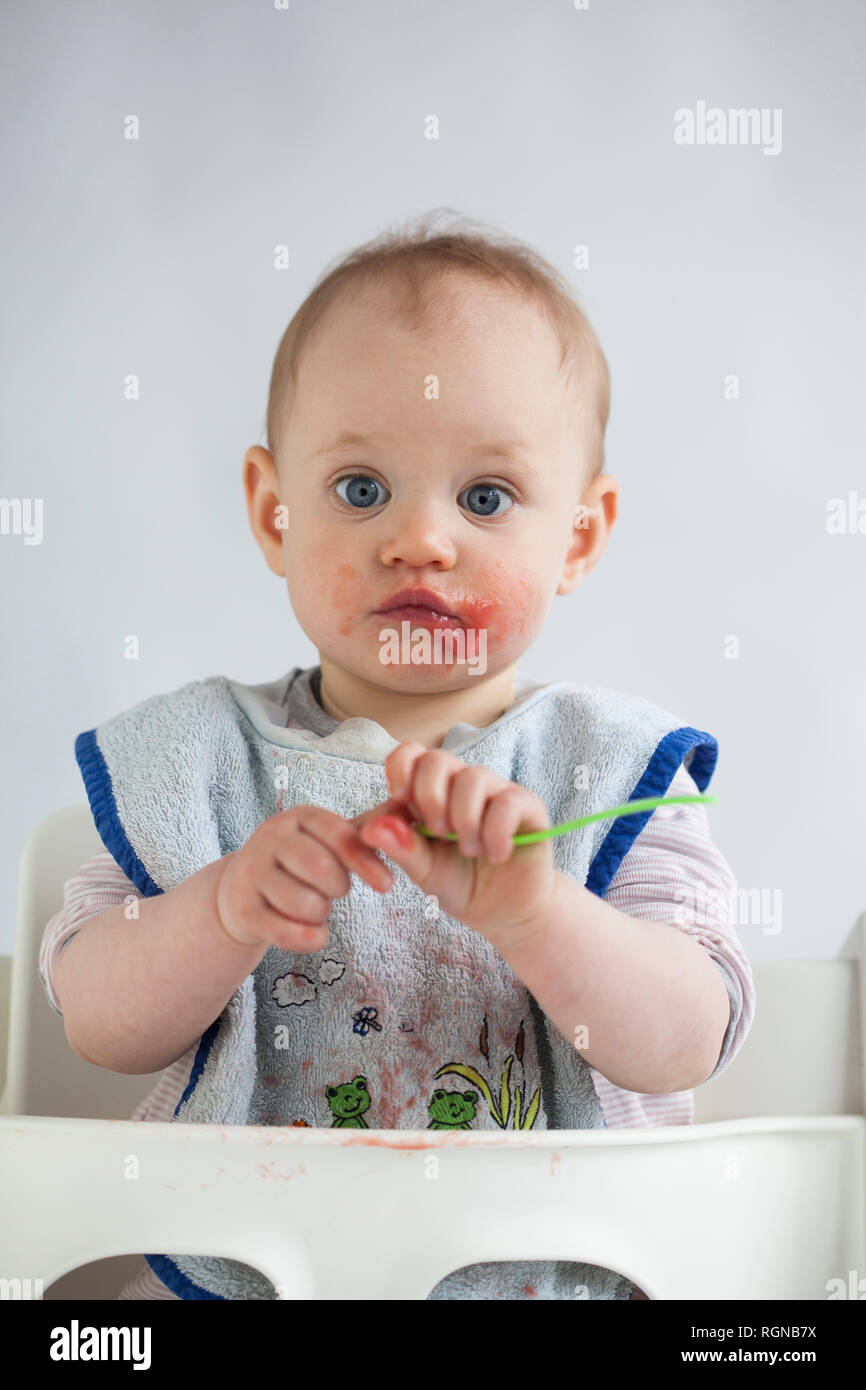 Baby portraits eating hi-res stock photography and images - Alamy
