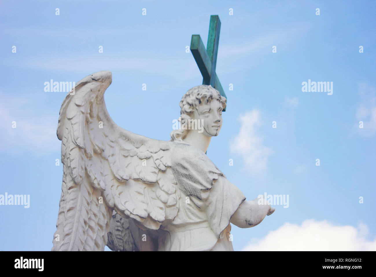 Roman statue with a cross Stock Photo - Alamy