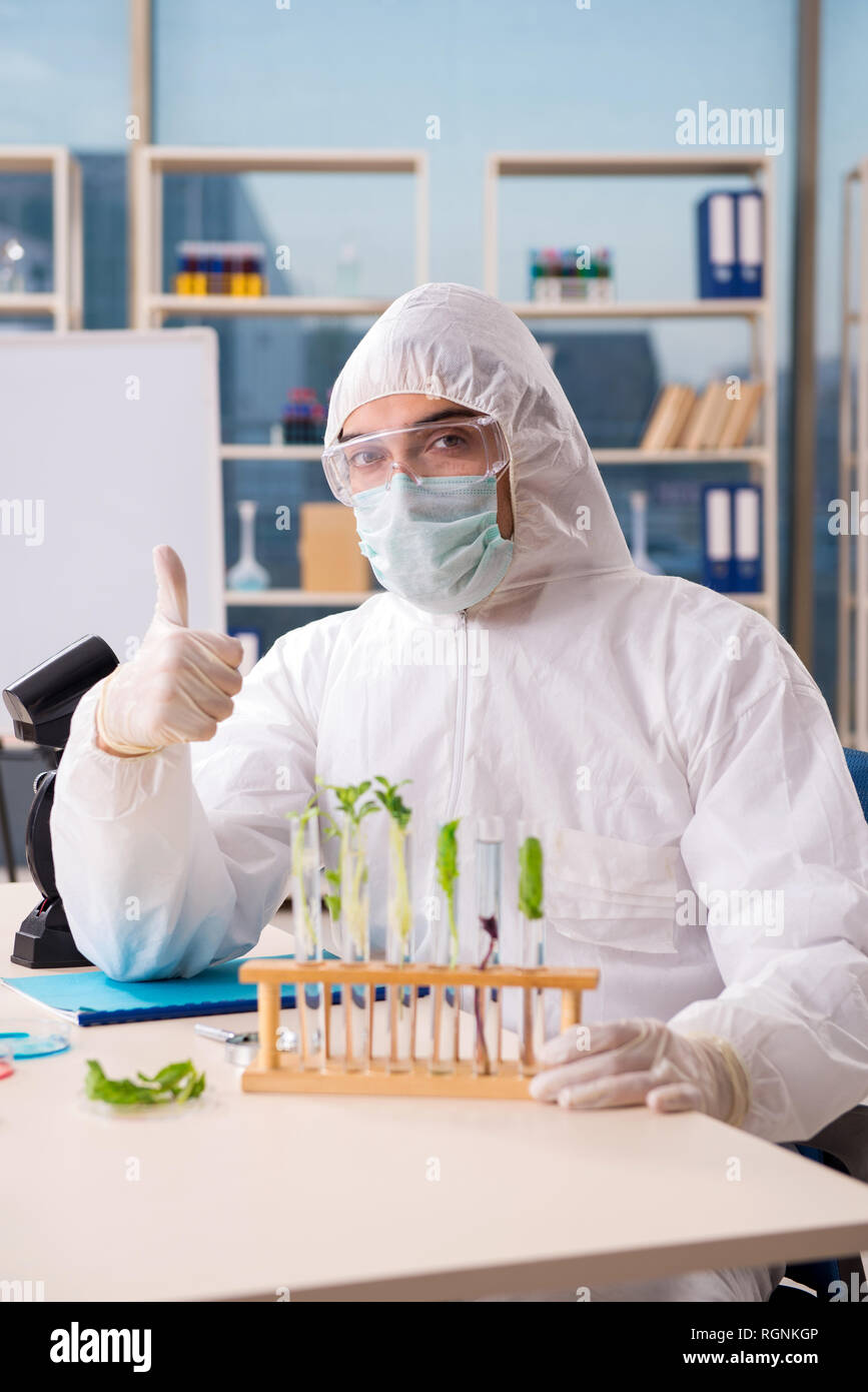 Male biotechnology scientist chemist working in the lab Stock Photo - Alamy