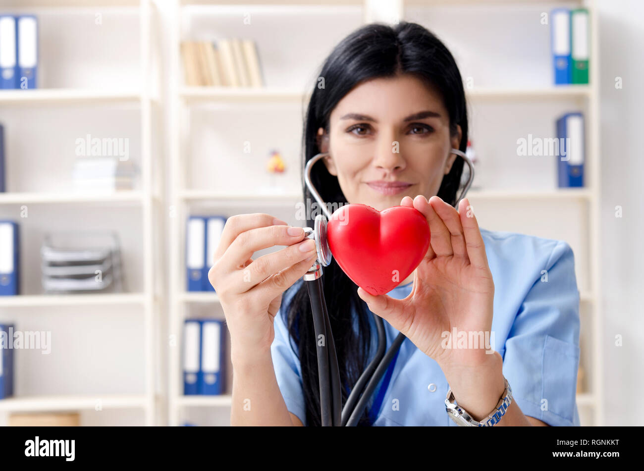 Female doctor cardiologist working in the clinic Stock Photo - Alamy