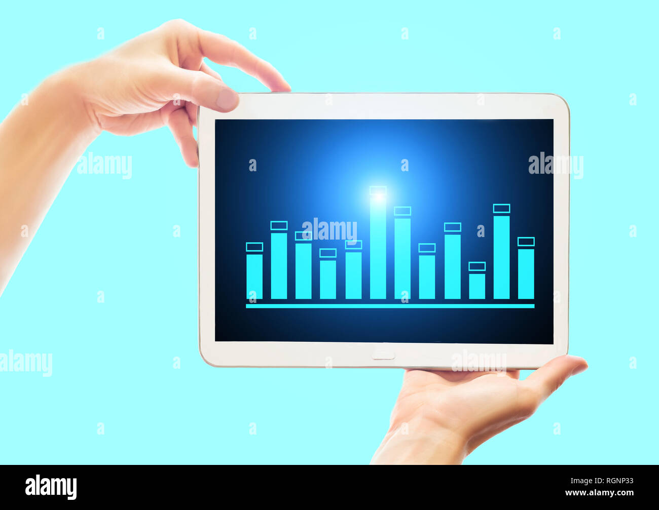 Business woman shows a tablet with a sales graph. Profit analytics ...