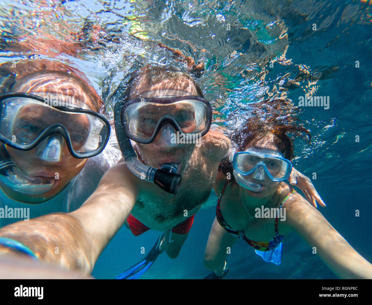 Snorkeling friends making underwater selfie in the sea Stock Photo - Alamy