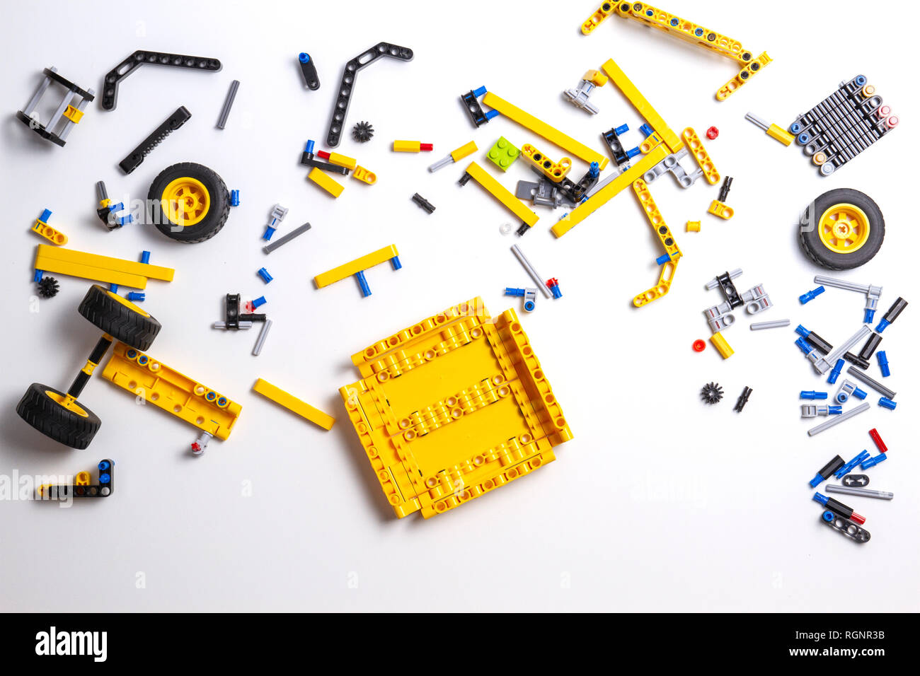 Robot car constructor details on white table. Robotic, learning ...