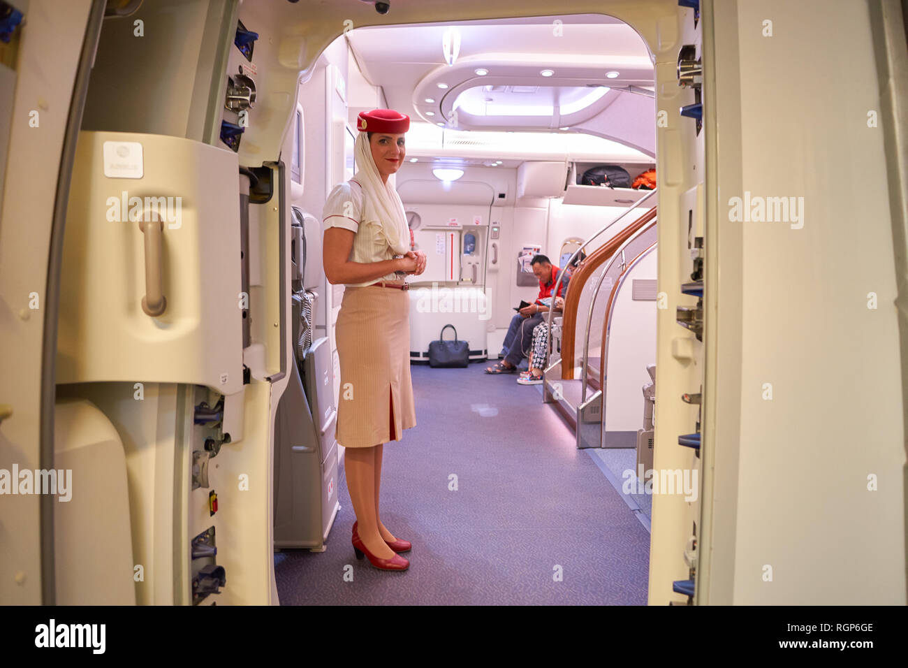 DUBAI, UAE - CIRCA NOVEMBER 2016: Emirates crew member on board of A380 ...