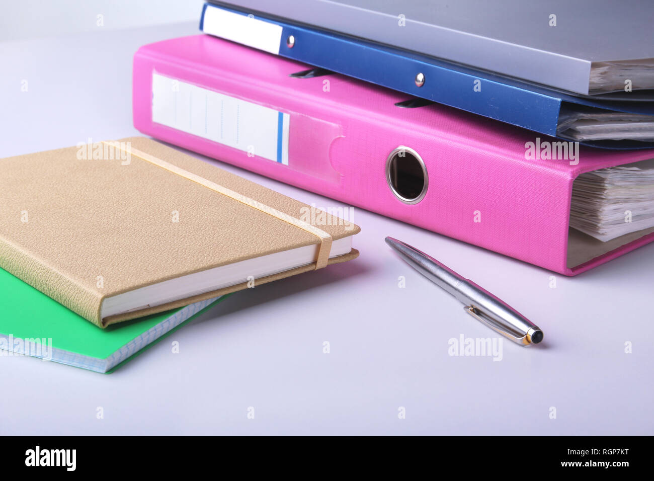 Folder file, note and pen on the desk. blurred background Stock Photo ...