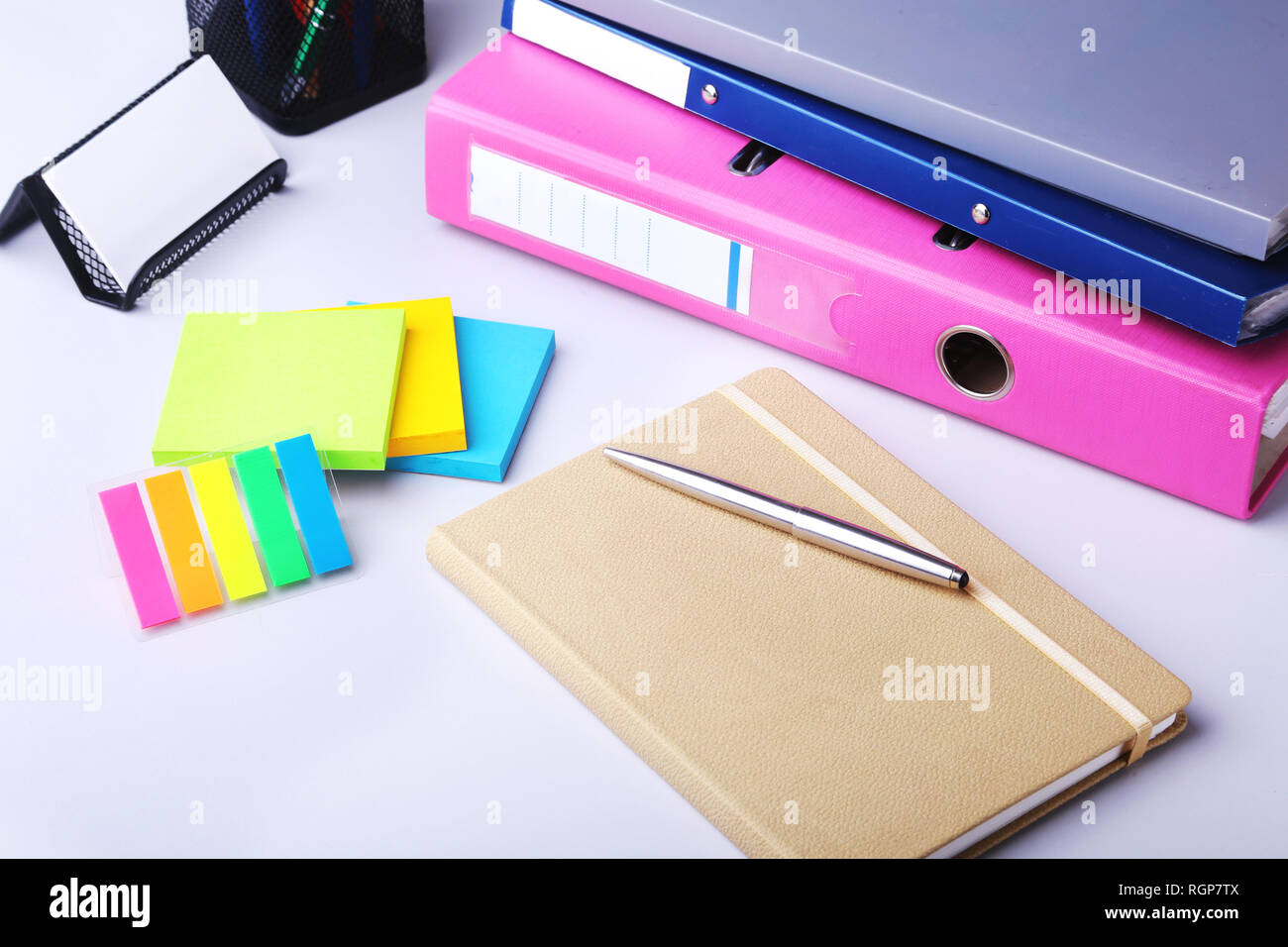 Folder file, note and pen on the desk. blurred background Stock Photo ...