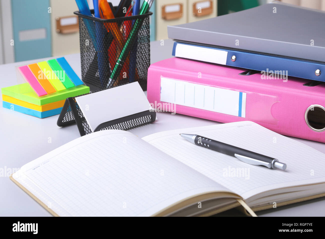 Folder file, note and pen on the desk. blurred background Stock Photo ...