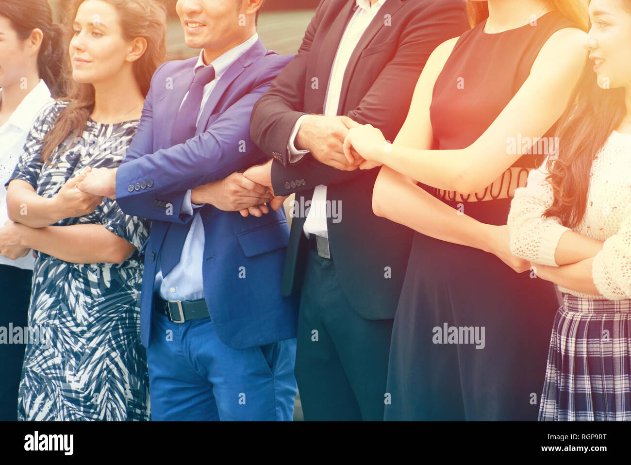 Business teamwork join hands together Stock Photo - Alamy