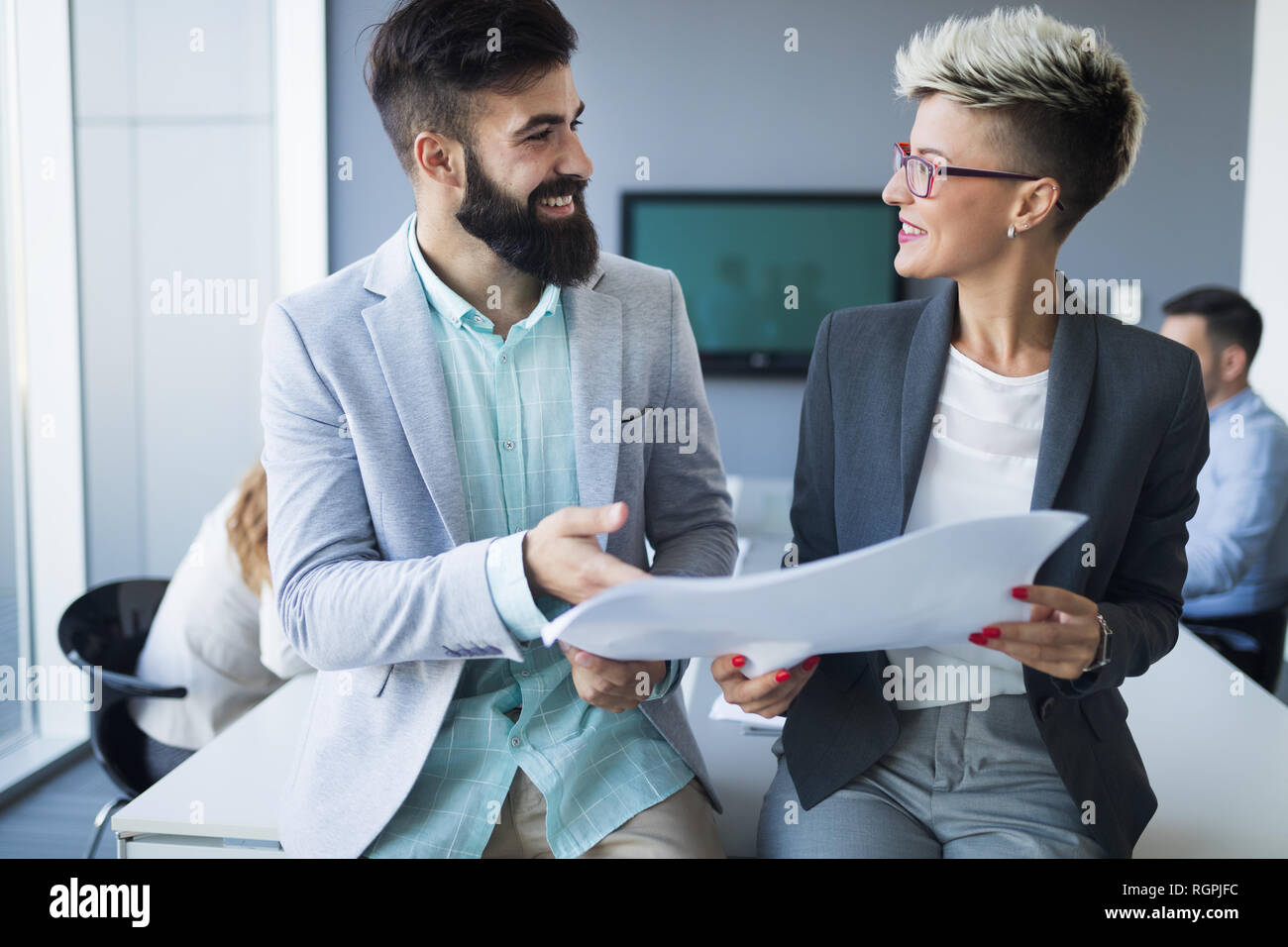 Picture of handsome man and woman as business partners Stock Photo - Alamy