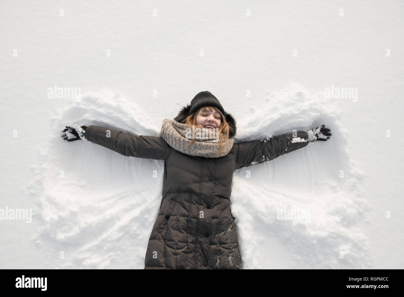 Woman snow angel hi-res stock photography and images - Alamy