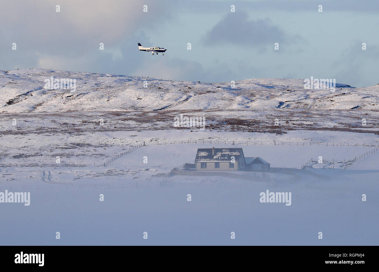 Morning fog floats through the valley at Tingwall on the Shetland ...