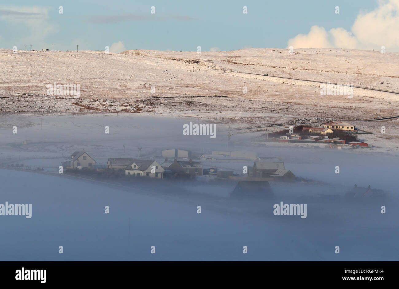Morning fog floats through the valley at Tingwall on the Shetland ...