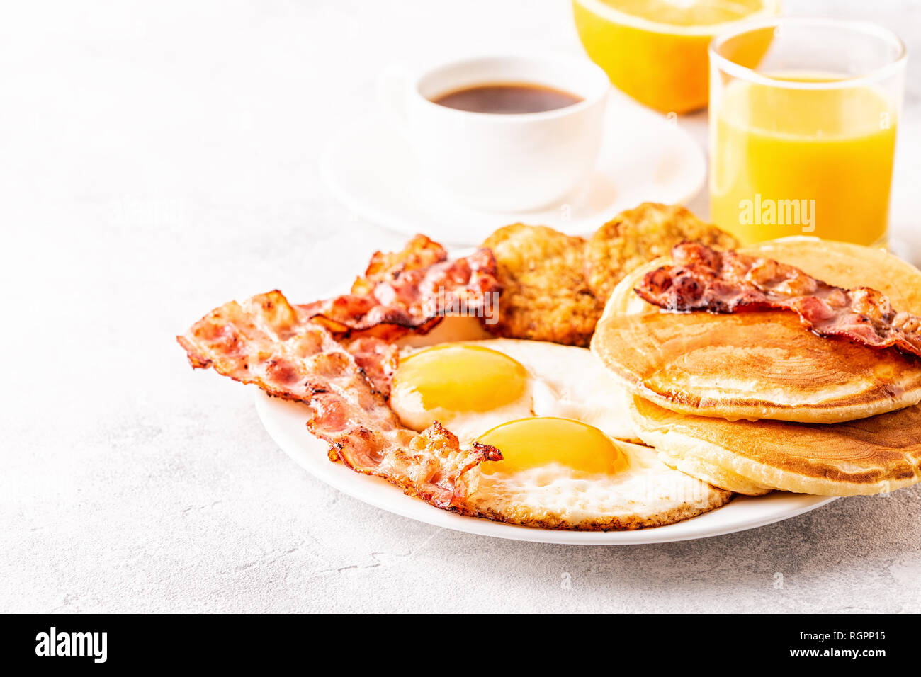 Healthy Full American Breakfast with Eggs Bacon Pancakes and Latkes ...