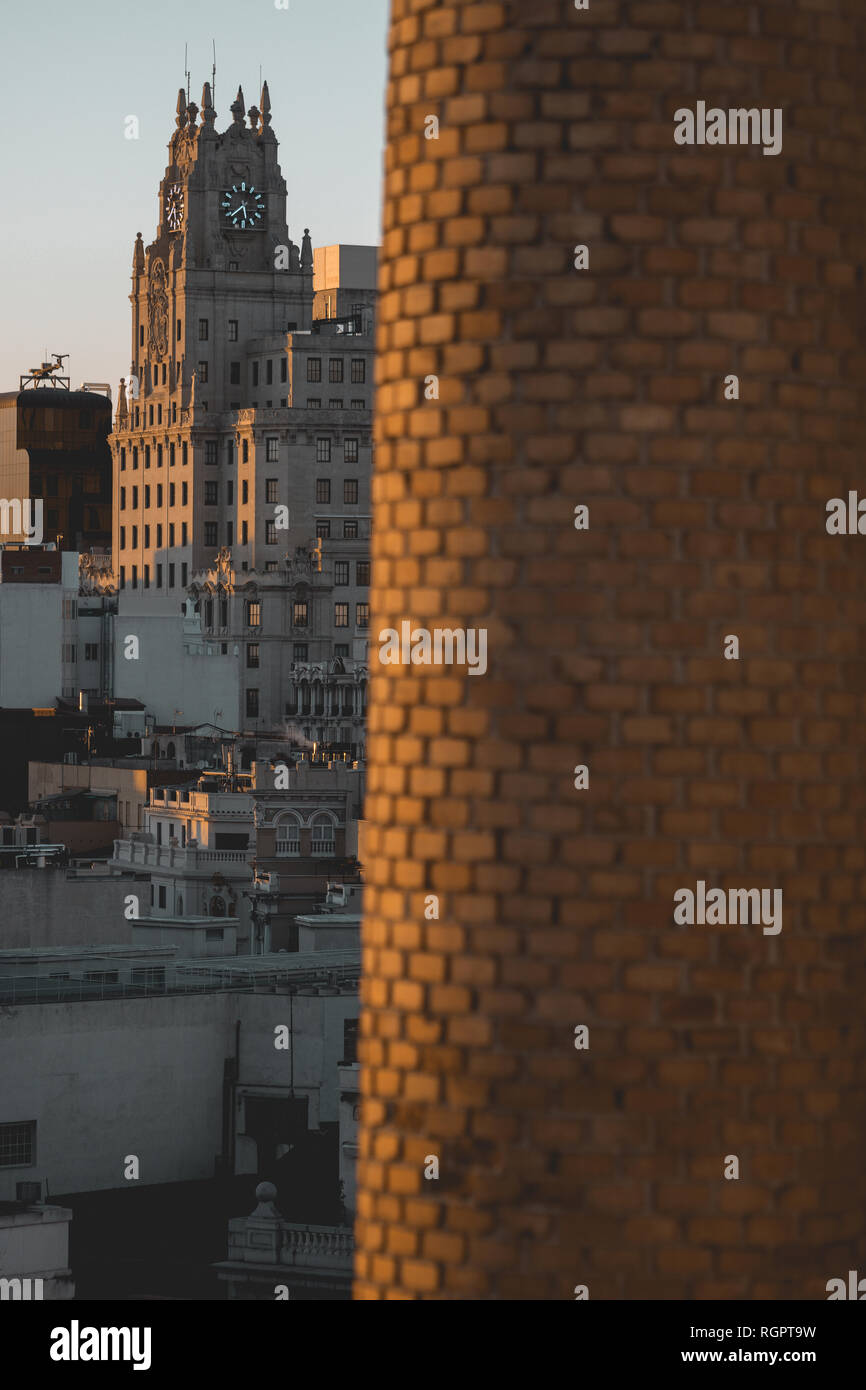 View of city buildings in sunlight Stock Photo - Alamy