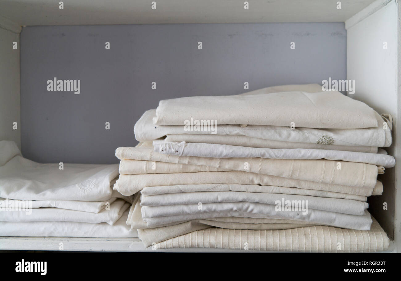 Natural cotton sheets in shop selling ethically sourced products Stock ...