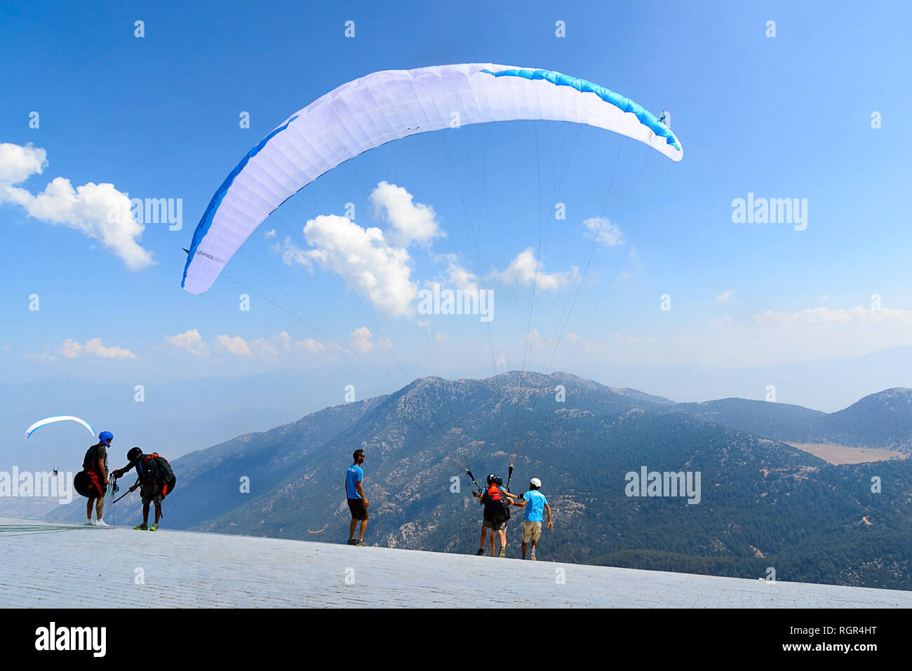 help white paraglider soar into the sky Stock Photo - Alamy
