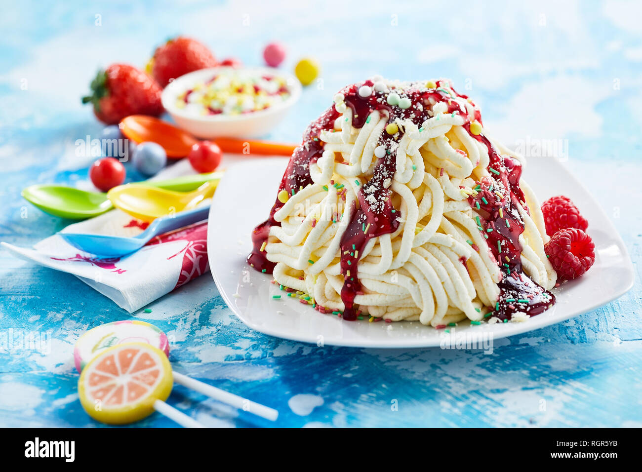 Spaghetti ice cream dessert with sweet raspberry topping Stock Photo ...