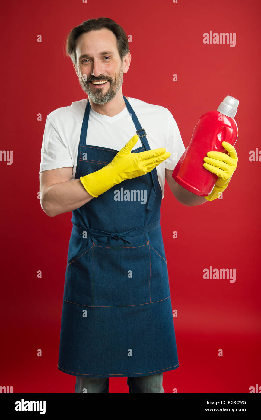 Cleaning day today. Bearded guy cleaning home. Cleanliness and order ...
