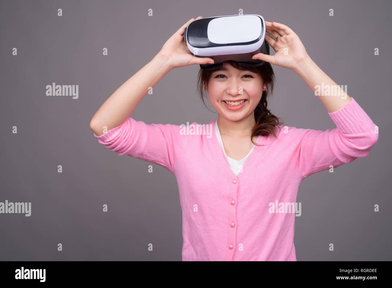Woman removing her glasses hi-res stock photography and images - Alamy