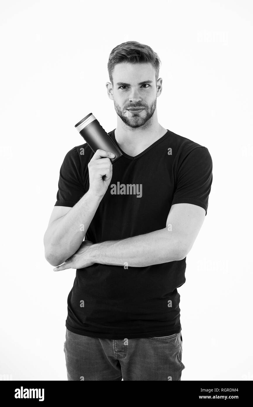 Man bearded stylish hold plastic shampoo bottle. Guy handsome use ...