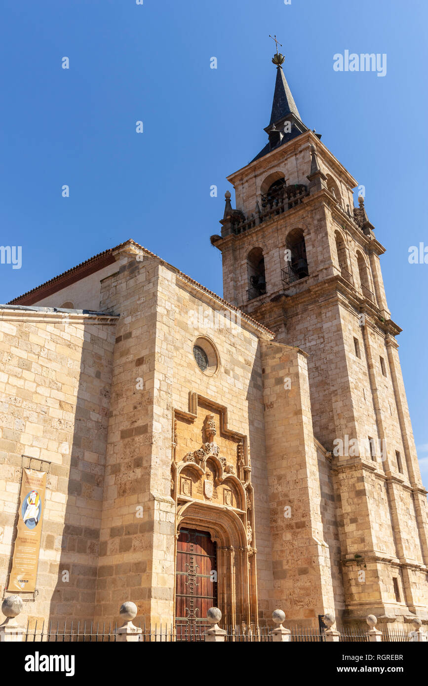 A typical Spanish Church with an ornate doorway and bell tower. A clear ...